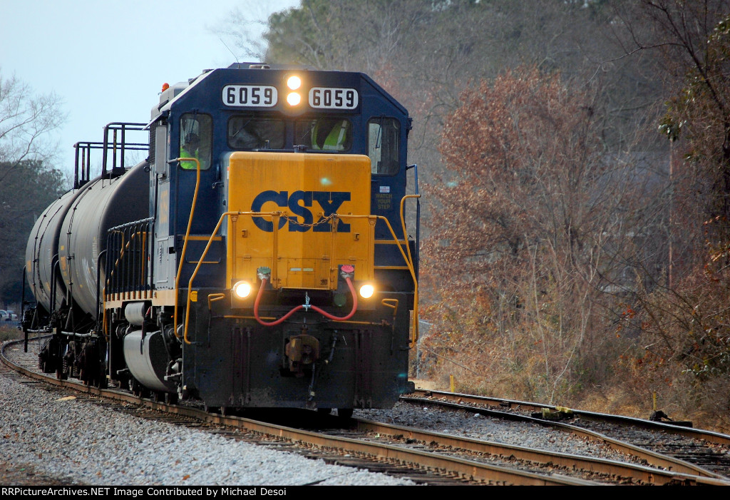 CSX GP-40-2 #6059 is switching 2 tank cars
